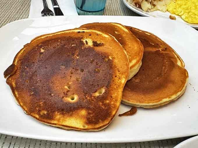 Golden-brown perfection on a plate &ndash; these classic pancakes showcase the simple beauty of breakfast done right.
