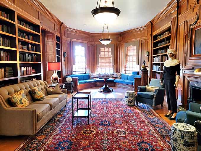 Warm wood paneling embraces visitors in the Butternut Room, where books and comfortable seating invite you to channel your inner aristocrat.