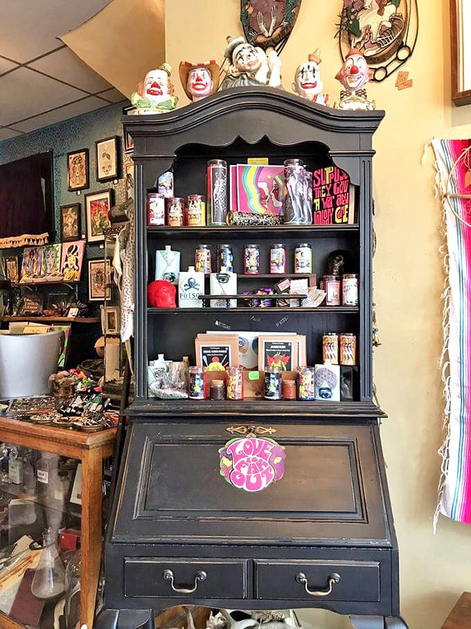 Vintage meets irreverent in this cabinet display, where antique clown figurines preside over a collection that's equal parts nostalgic and mischievous.