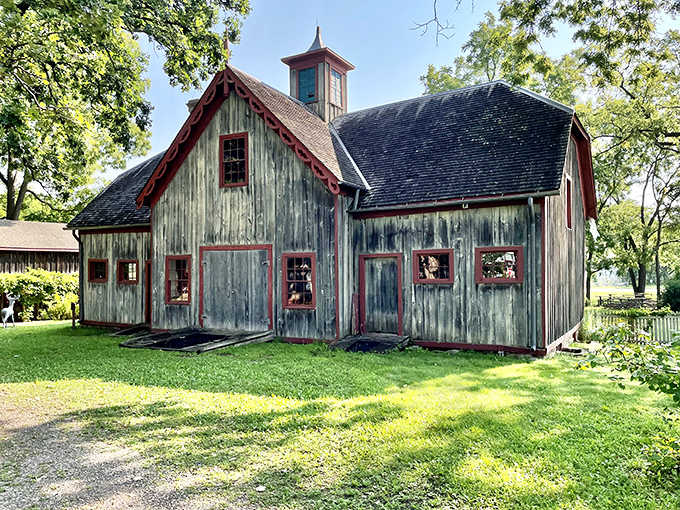 The weathered carriage barn whispers tales of horse-drawn journeys and simpler transportation, making your car troubles seem laughably modern by comparison.