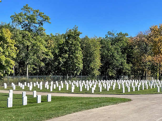 Fort Sheridan Cemetery's orderly rows of white headstones create a powerful visual reminder of service and sacrifice through generations.