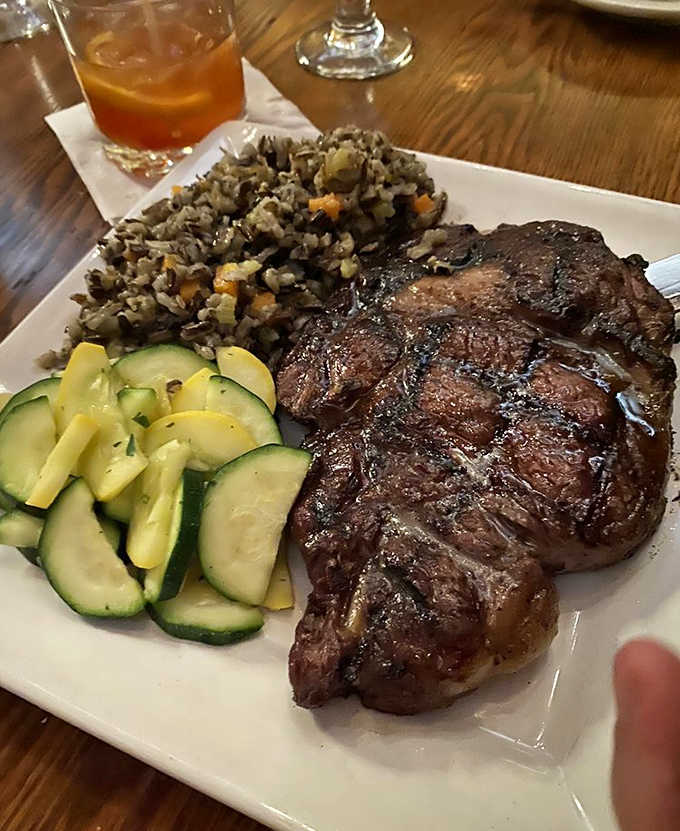 This isn't just any steak &ndash; it's a perfectly chargrilled masterpiece with a smoky exterior giving way to juicy tenderness that makes conversation impossible.