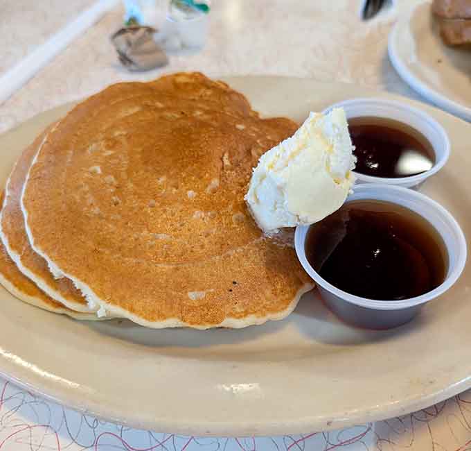 These golden pancakes with butter and syrup are what breakfast dreams are made of, fluffy and perfect every single time.
