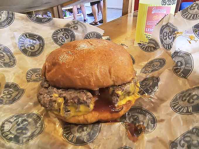 Melted cheese cascades over a perfectly grilled patty &ndash; this isn't just a burger, it's edible nostalgia between two buns.