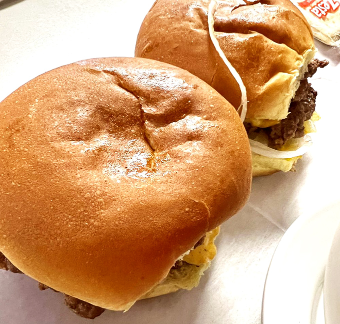 These aren't just burgers, they're edible time machines &ndash; juicy patties on soft buns that transport you back to when food was honest.