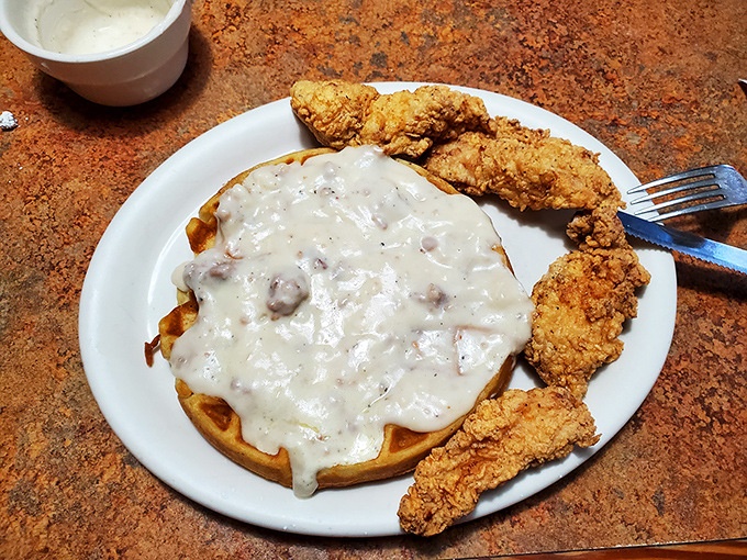 Chicken and waffles that would make your Southern grandmother weep with joy &ndash; crispy, juicy perfection meets fluffy waffle drowning in creamy gravy.