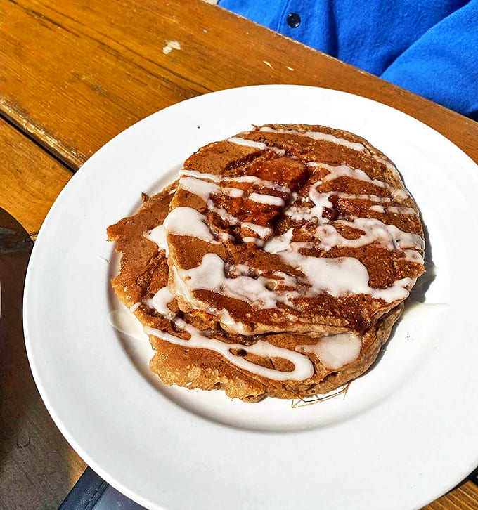 Cinnamon Roll Pancakes Breakfast alchemy at its finest &ndash; fluffy pancakes infused with cinnamon swirls and drizzled with sweet glaze. Diet? What diet?