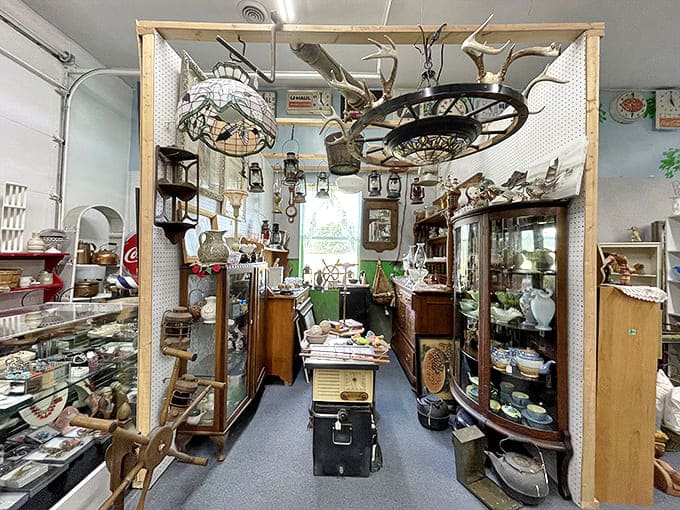 This carefully curated corner showcases antlers, glassware, and vintage furnishings – a hunter-gatherer's dream of Americana displayed with rustic charm.