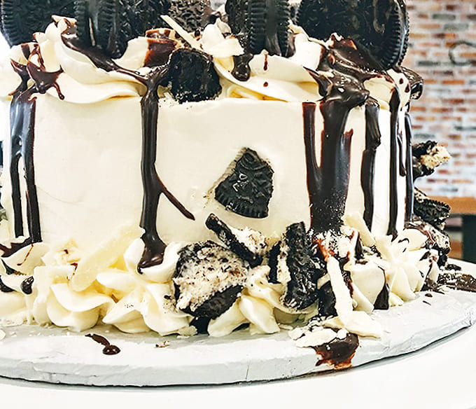 This cookies and cream cake towers like a delicious skyscraper, dripping with chocolate and topped with cookie pieces that make architectural engineering look downright tasty.