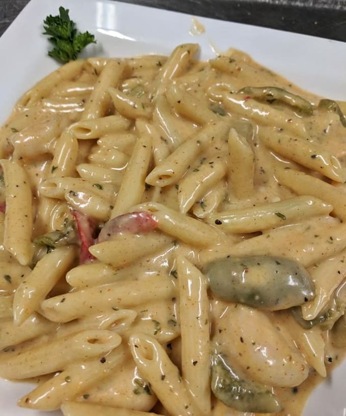 Creamy Cajun pasta that clings to each penne like they were made for each other &ndash; spicy, rich, and utterly satisfying.