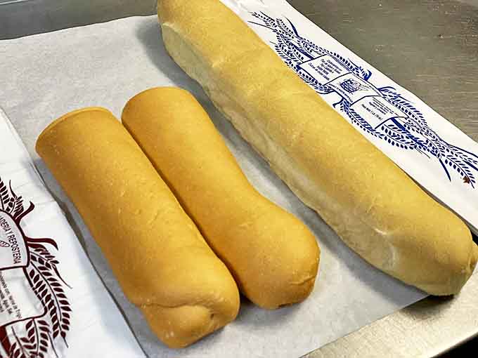 Golden loaves of Pan Sobao rest like sleeping beauties, waiting to transform your morning coffee ritual into something extraordinary.