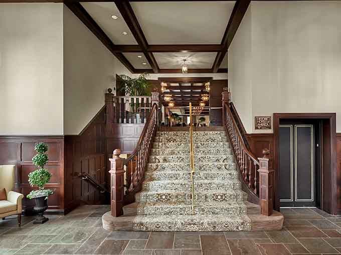Bathroom bliss awaits with marble surfaces and gleaming fixtures that make morning routines feel like a spa retreat.