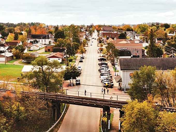 Downtown Norway unfolds beneath rolling hills, its classic Midwest architecture creating a postcard-perfect scene that time seems to have gently preserved.