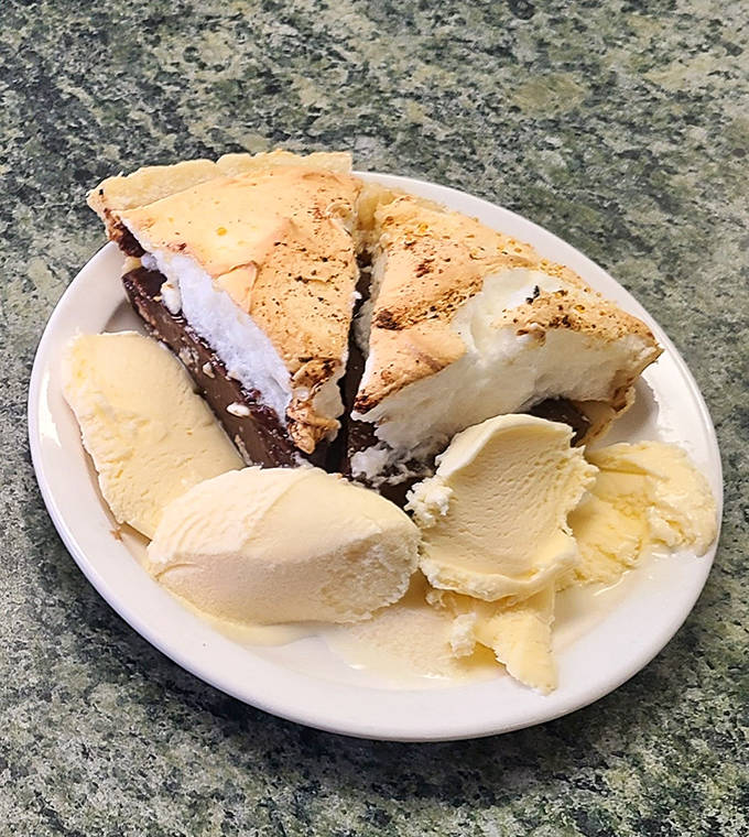 This slice of heaven isn't just dessert &ndash; it's an edible masterpiece with perfectly browned meringue peaks that would make your grandmother weep with joy.