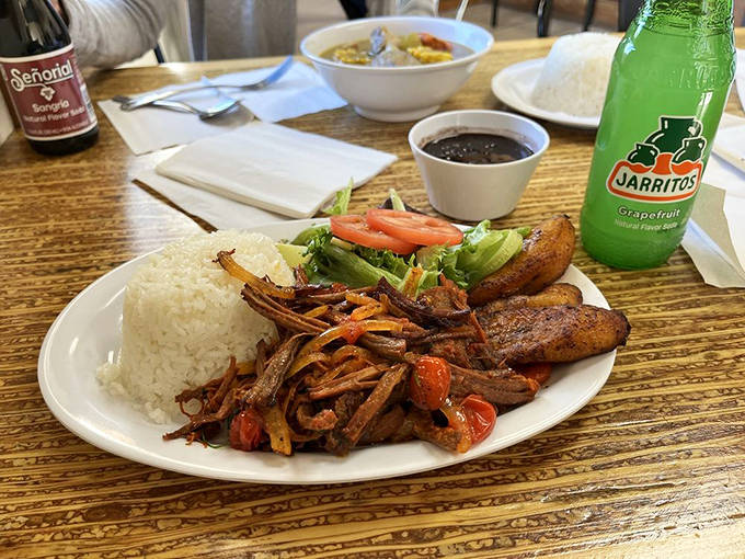 Tender shredded beef swimming in a savory tomato sauce, paired with rice so perfectly cooked it deserves its own fan club.