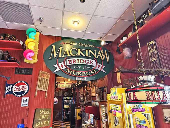 This way to history! The museum entrance sign promises free admission to a world of engineering marvels just steps away from your pizza.