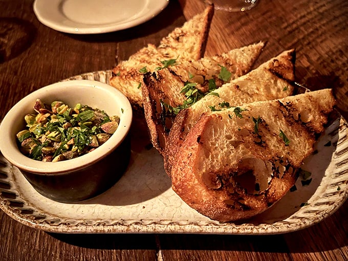 House-made fettunta with olive oil &ndash; proof that the simplest pleasures are often the most profound when executed with care.