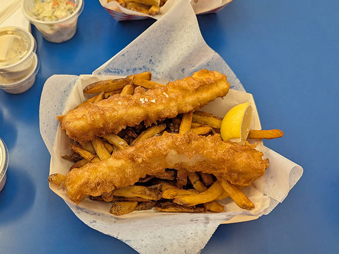 Golden-battered fish rests atop a bed of perfectly crisp fries&mdash;a symphony of textures that explains why people drive for miles.