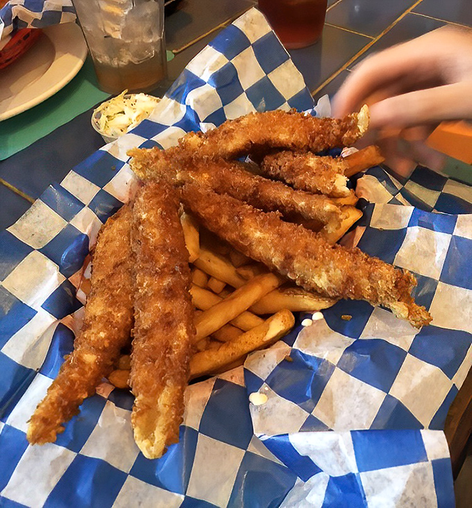 Golden-fried fish fingers that would make Captain Birds Eye weep with envy, perfectly paired with crispy fries.