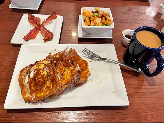 French toast that makes you question all other breakfast choices &ndash; golden, caramelized perfection with a side of bacon that's achieved crispy-chewy nirvana.