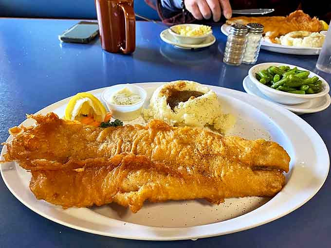Golden, crispy perfection on the outside, flaky tenderness within &ndash; this is fish fry mastery that keeps locals coming back.
