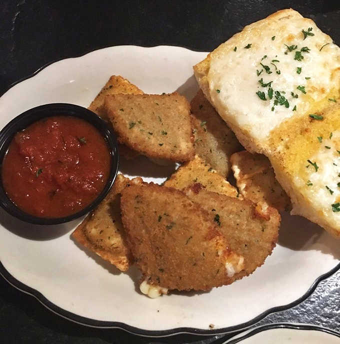 Crispy outside, molten cheese inside &ndash; Alongi's toasted ravioli and garlic cheese bread make a compelling case for never skipping appetizers again.