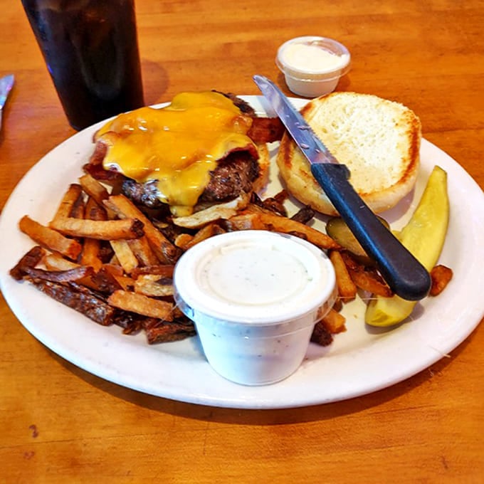 This isn't just any cheeseburger &ndash; it's a masterpiece of melted cheese, perfectly cooked beef, and hand-cut fries that'll haunt your dreams.