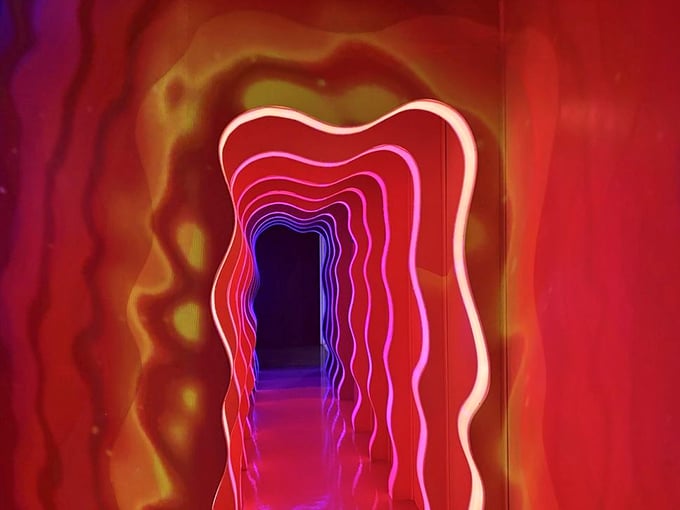 Journey through this pulsating neon portal &ndash; each glowing ring drawing you deeper into a dimension where reality bends.
