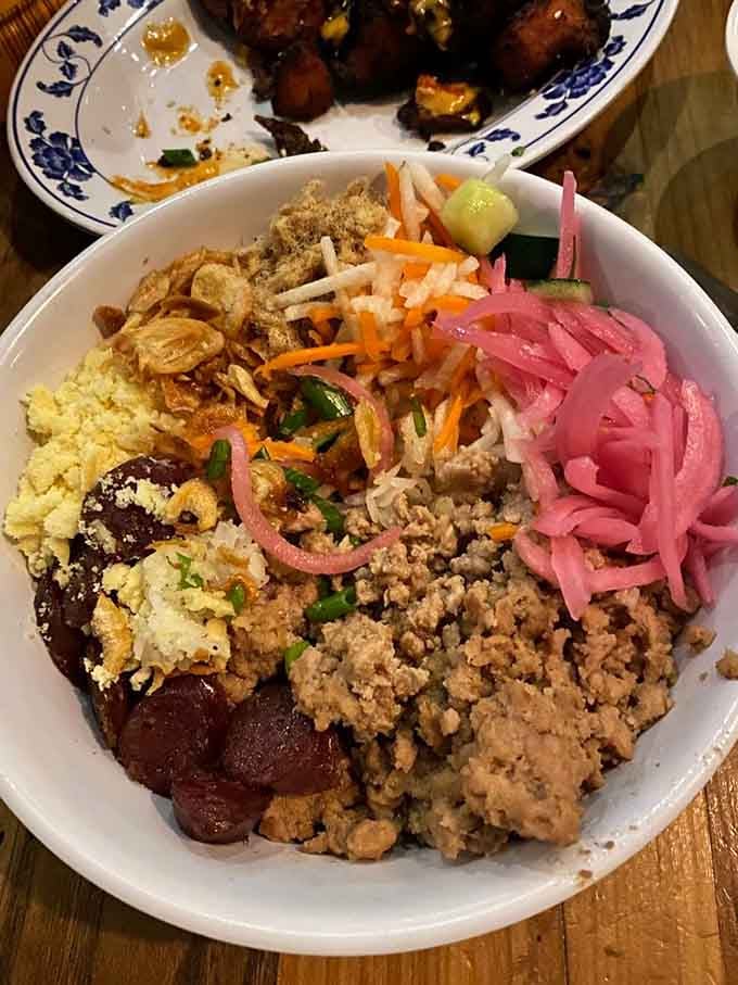 The sticky rice bowl arrives like edible art, layers of flavor and texture that'll have you savoring every single bite.