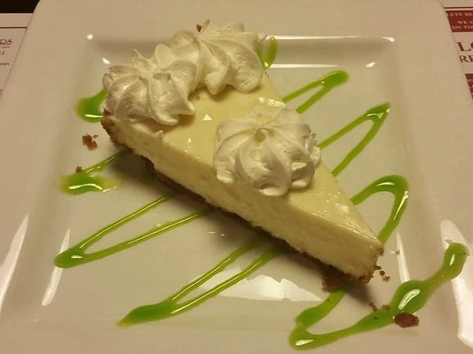 The star attraction: homemade key lime pie with perfect tartness-to-sweetness ratio and artistic presentation that makes dessert feel like a special occasion.