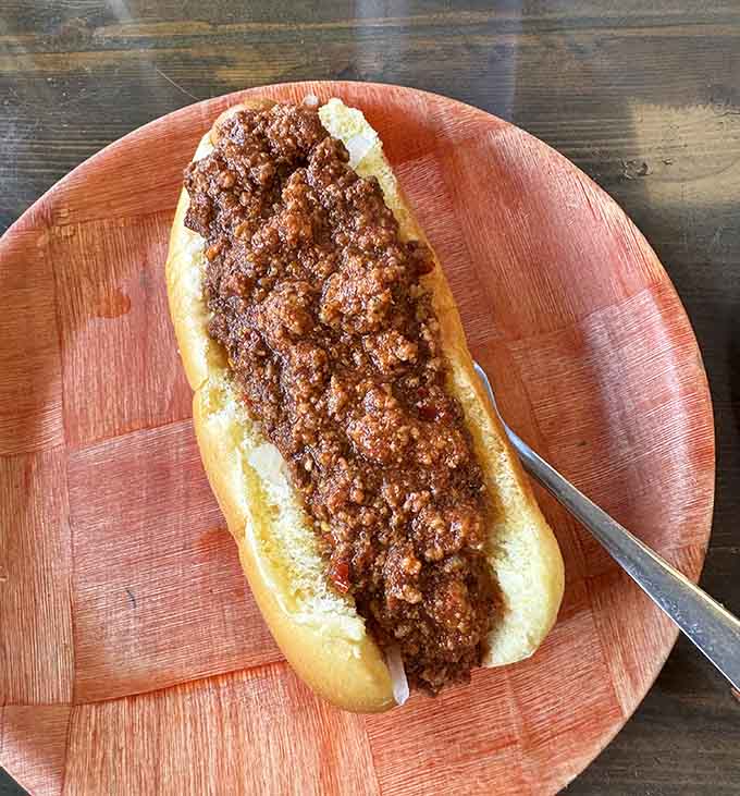 Behold the chili dog in all its glory, generously topped with homemade chili that's been perfecting hearts since 1998.