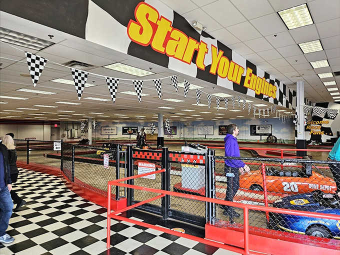 Start your engines! The indoor go-kart track transforms cautious parents into competitive speed demons with checkered flag dreams.