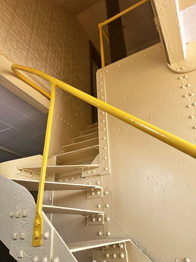 These sturdy iron stairs have carried lighthouse keepers up and down for decades, a reminder of the dedicated souls who once called this beacon home.