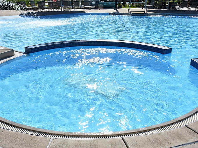 Pristine blue waters invite swimmers of all ages to dive in and leave their worries behind in this shimmering oasis.