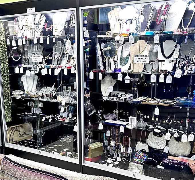 Jewelry that witnessed decades of special occasions sparkles under glass. Each ring holds secrets of proposals, anniversaries, and celebrations long past.