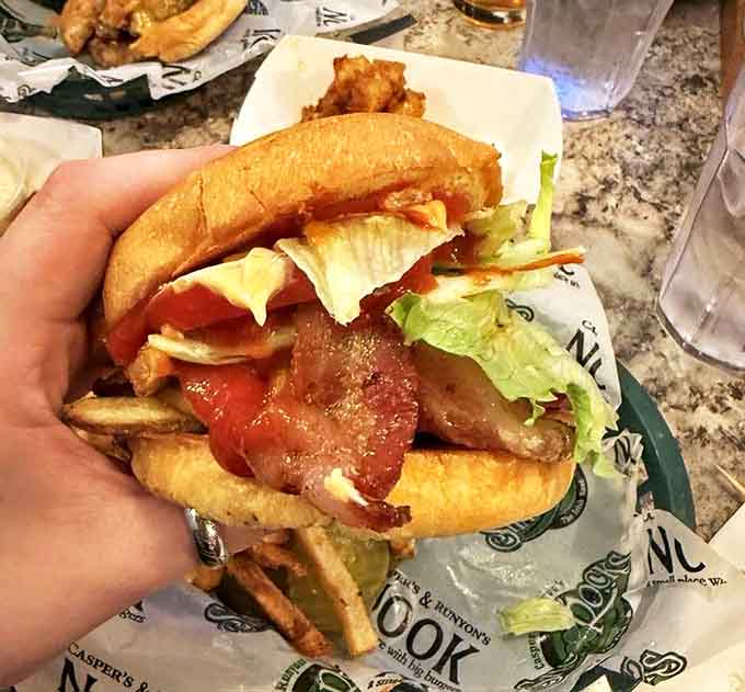 Behold the moment of truth, when molten cheese erupts from perfectly seasoned beef, creating that signature Minnesota magic.