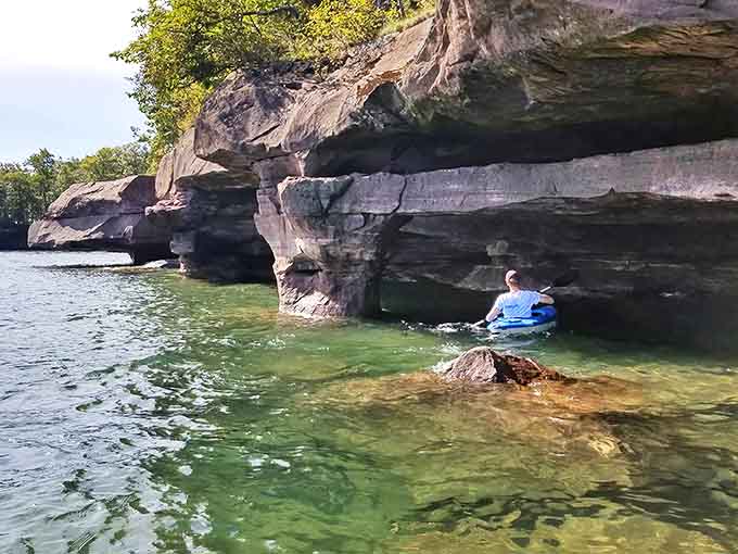 Gliding through these ancient sea caves feels like entering nature's own cathedral, where water and stone have collaborated for millennia.
