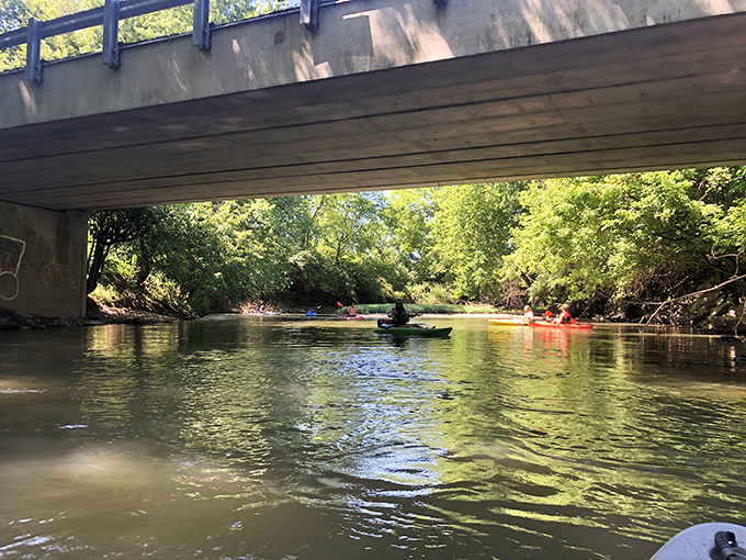 Kayaking under bridges &ndash; nature's way of saying "Hey, put down that phone and look at THIS instead!"