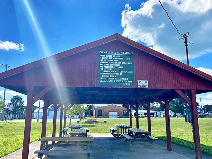 Kingston's park pavilion stands ready for community gatherings, a wooden sentinel that's witnessed countless potlucks and summer celebrations.