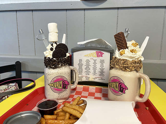 These milkshakes aren't just drinks, they're engineering marvels topped with enough goodies to make your inner child do a happy dance.