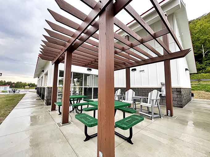 Conversation areas where strangers become friends, all under the gentle shade of a pergola with lake views that steal the show.