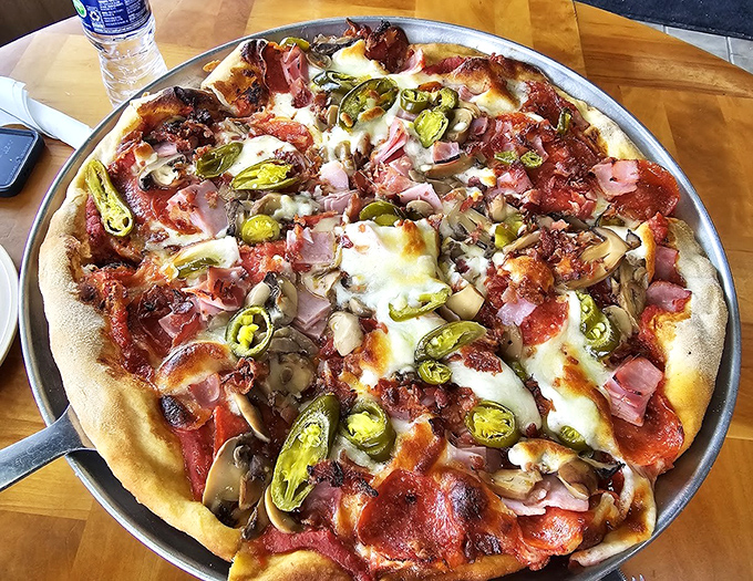 This loaded masterpiece doesn't just have toppings &ndash; it has an entire neighborhood of ingredients having a block party on your taste buds.