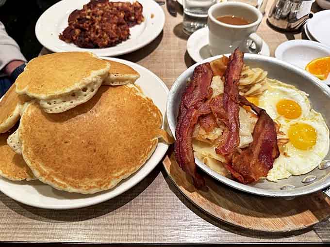 Pancake perfection meets crispy bacon in a breakfast symphony that's been bringing Chicagoans to their knees since 1923.