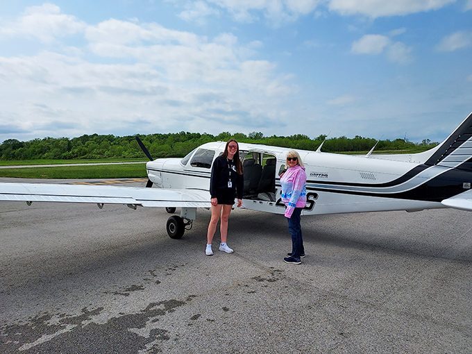Small aircraft at North Bass Island's airstrip: The island's "international airport" – a humble landing strip where arriving feels like stepping into another era.