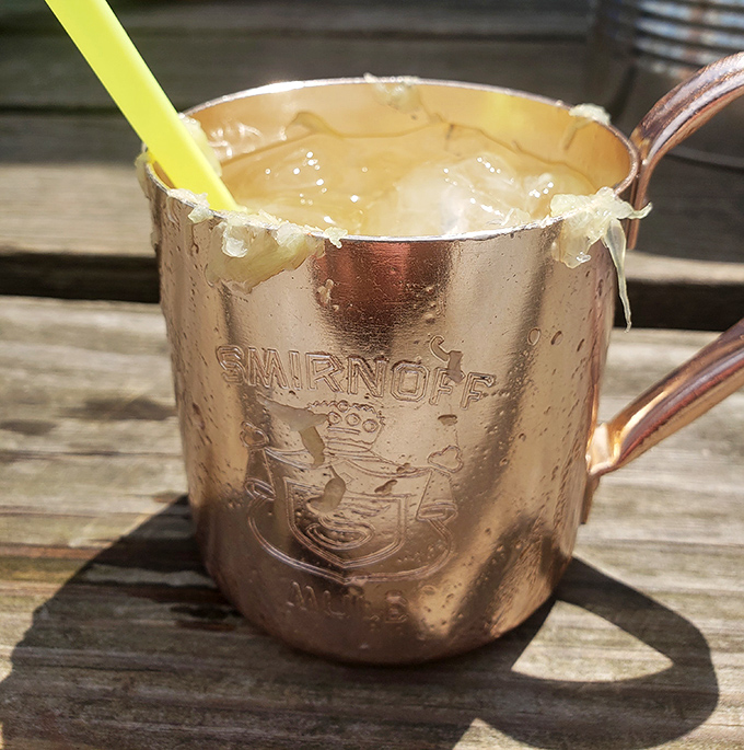 Frosty copper perfection: Each Mule comes in a Smirnoff-branded mug that keeps your drink icy while you warm up to the locals.