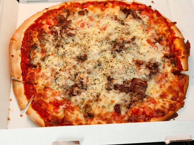 The meat lovers pizza doesn't apologize for its carnivorous glory, and neither should you when ordering it.