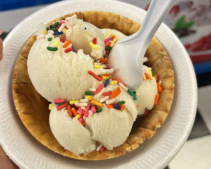 Oat milk vanilla proves that dairy-free doesn't mean flavor-free, delivering creamy satisfaction topped with rainbow sprinkles that make every bite a small celebration.