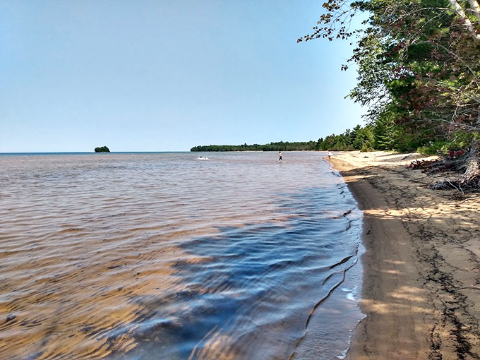 Lake Superior stretches to the horizon, a vast inland sea that makes you feel wonderfully small in the best possible way.
