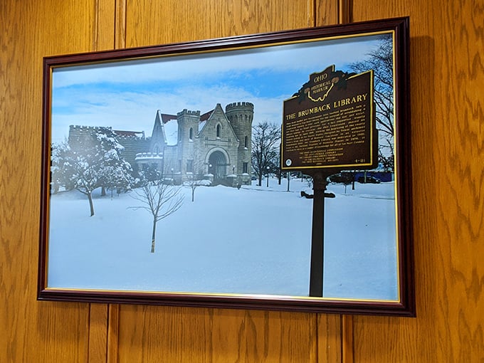 A framed winter scene reveals the Brumback's magical transformation when snow blankets its Gothic turrets and stone walls.