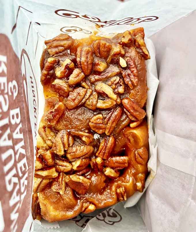 Tobie's famous pecan caramel roll &ndash; a spiral of soft dough drenched in buttery caramel and topped with crunchy pecans. Worth every calorie!